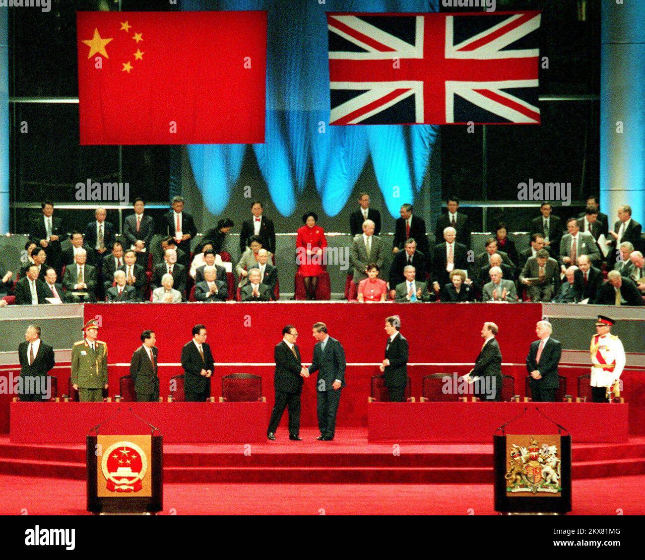 Jiang Zemin shakes hand with Prince Charles at the HK handover ceremony ...