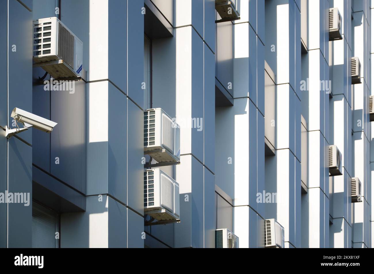 Many HVAC air conditioning and ventilation systems on wall. Outdoor Air ...