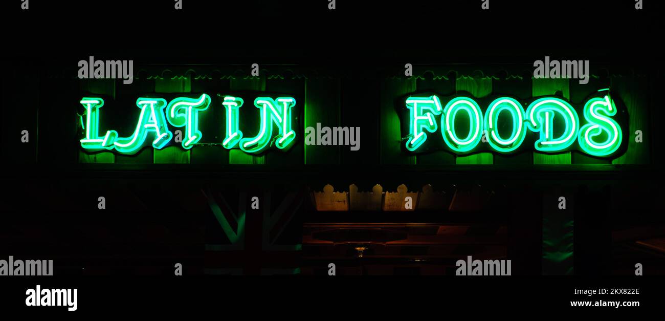 Neon shining signboard at night Stock Photo - Alamy