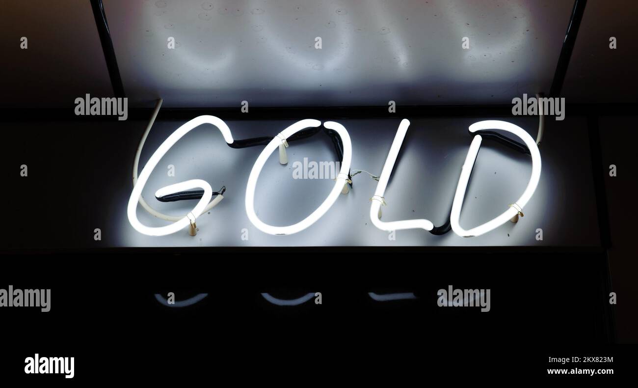 Neon shining signboard at night Stock Photo - Alamy