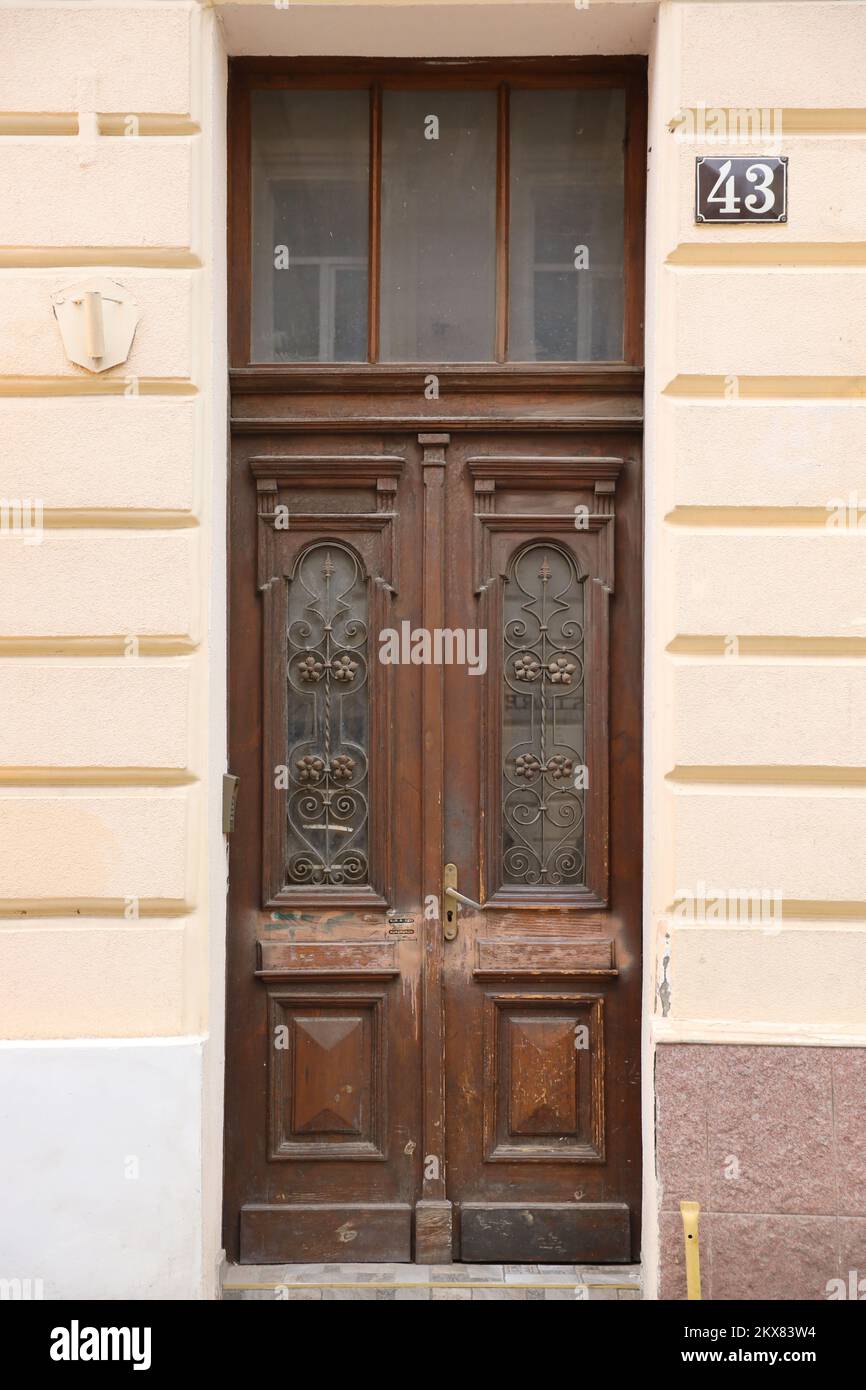 Old ancient wooden door texture in european medieval style. The ...