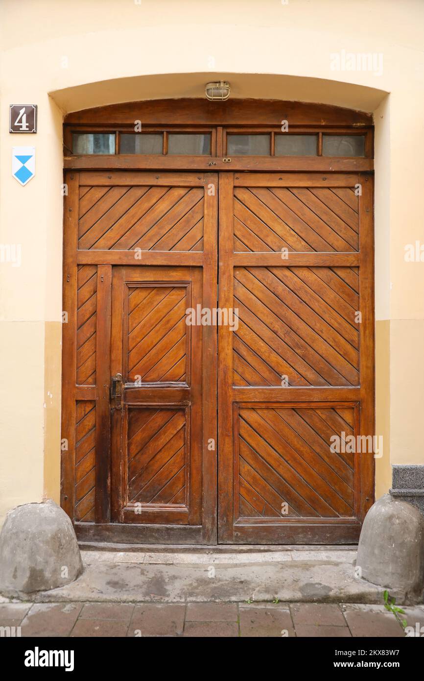 Old ancient wooden door texture in european medieval style. The ...