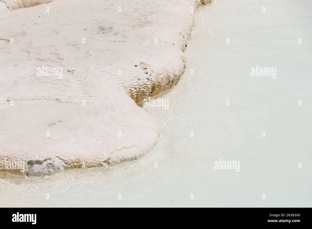 Texture of Pamukkale famous blue travertine pools and terraces. Unique ...