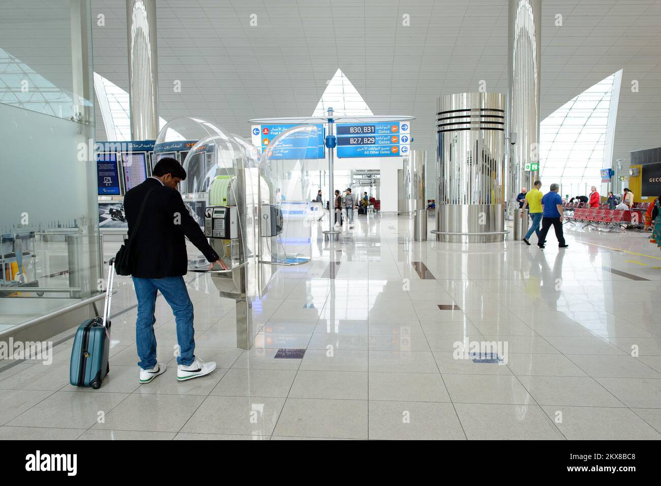 DUBAI, UAE - MARCH 10, 2015: DXB airport interior. Dubai International ...