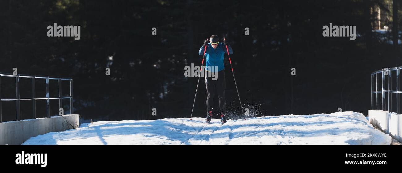 Nordic skiing or Cross-country skiing classic technique practiced by ...