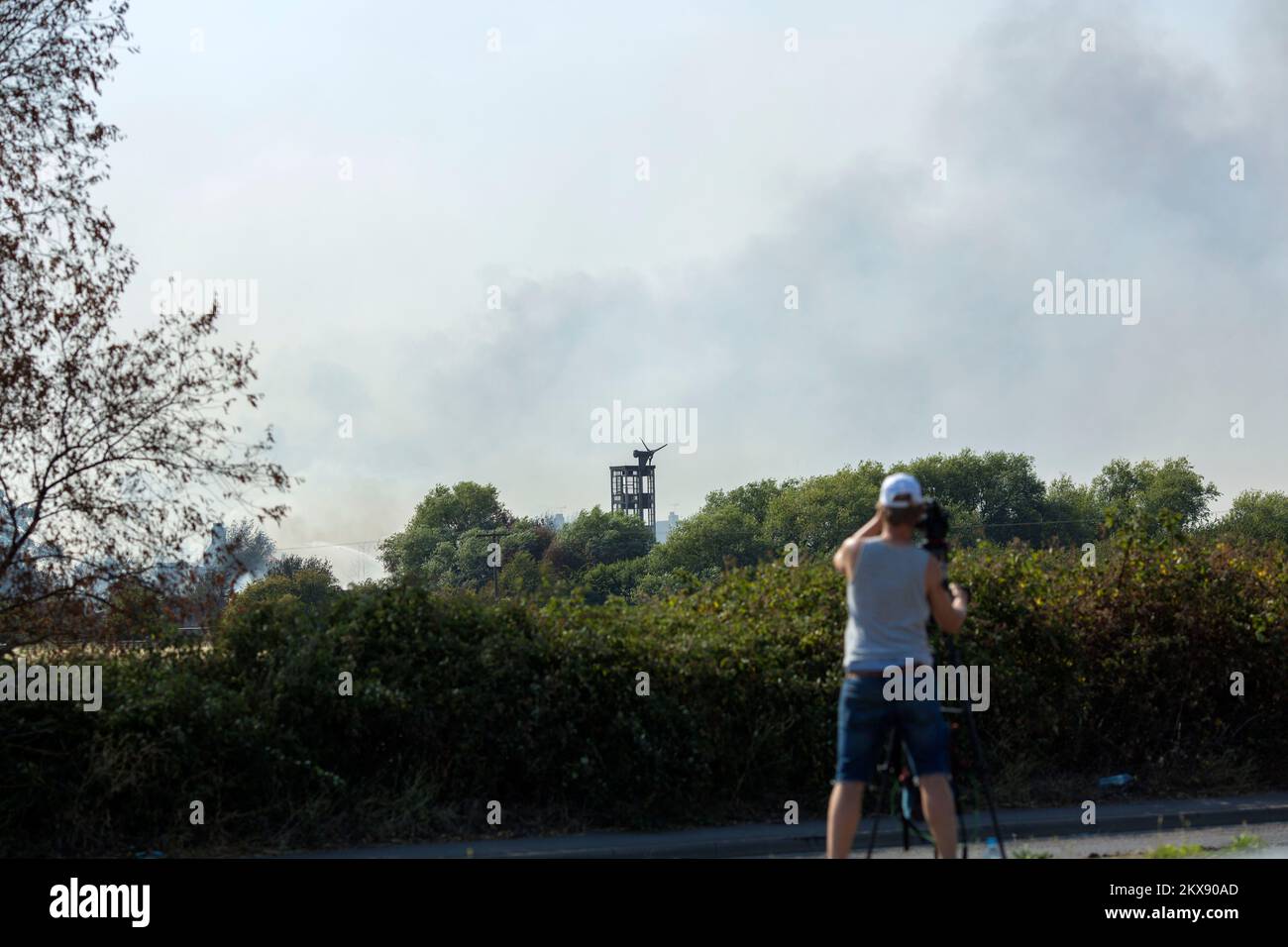 Smoke from a fire is seen in Wennington, east London, as the UK ...