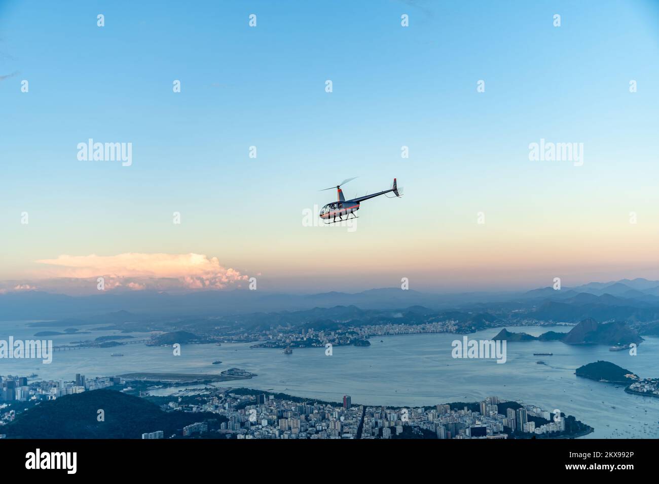 helicopter over the brazilian city of rio de janeiro. tourist ...