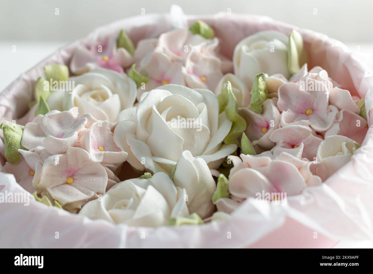 Zephyr bouquet of flowers in a pink box on a gray background Stock ...