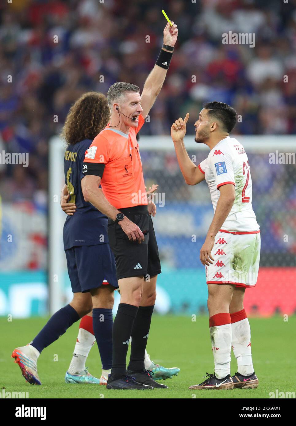 Al Rayyan, Qatar. 30th Nov, 2022. Referee Matthew Conger (2nd R) shows ...
