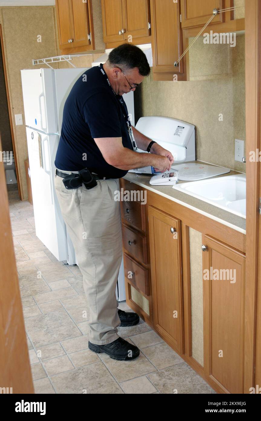 FEMA Housing Official at Temporary Housing Unit in Mississippi ...