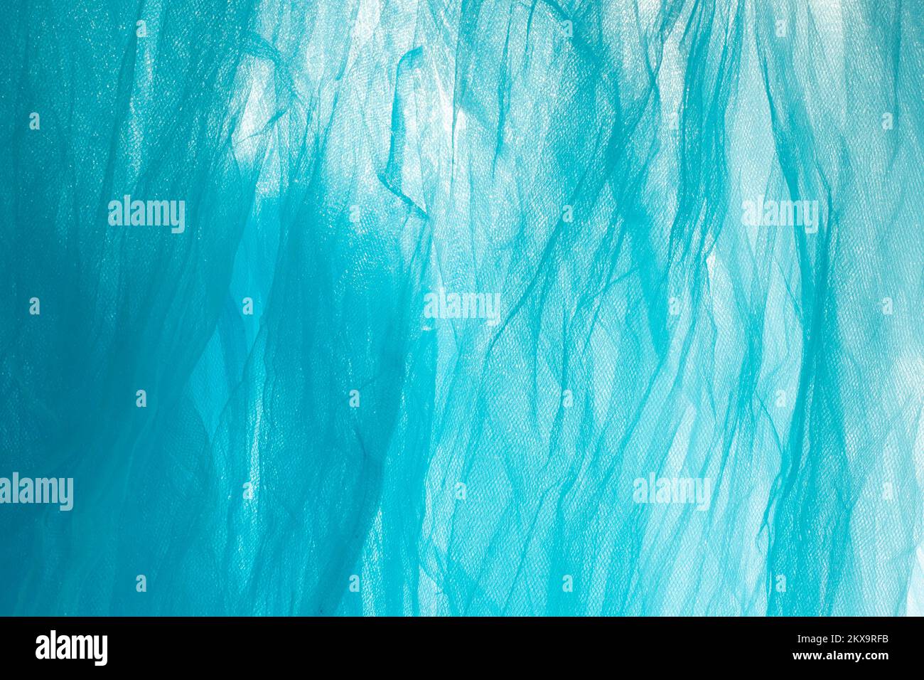 Bright blue fabric background hi-res stock photography and images - Alamy