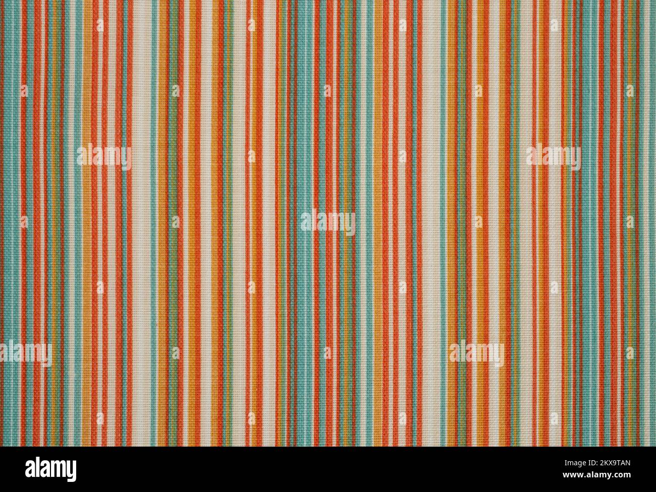 Multi colored fabric placemat, with vertical lines, Abstract close up ...