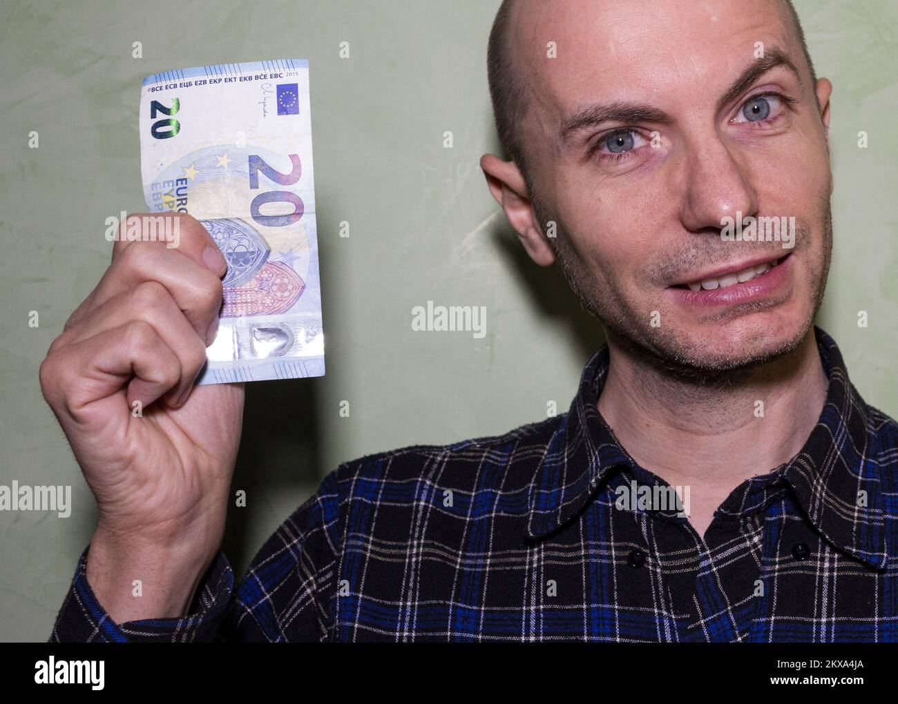 Boy money smiling hi-res stock photography and images - Alamy