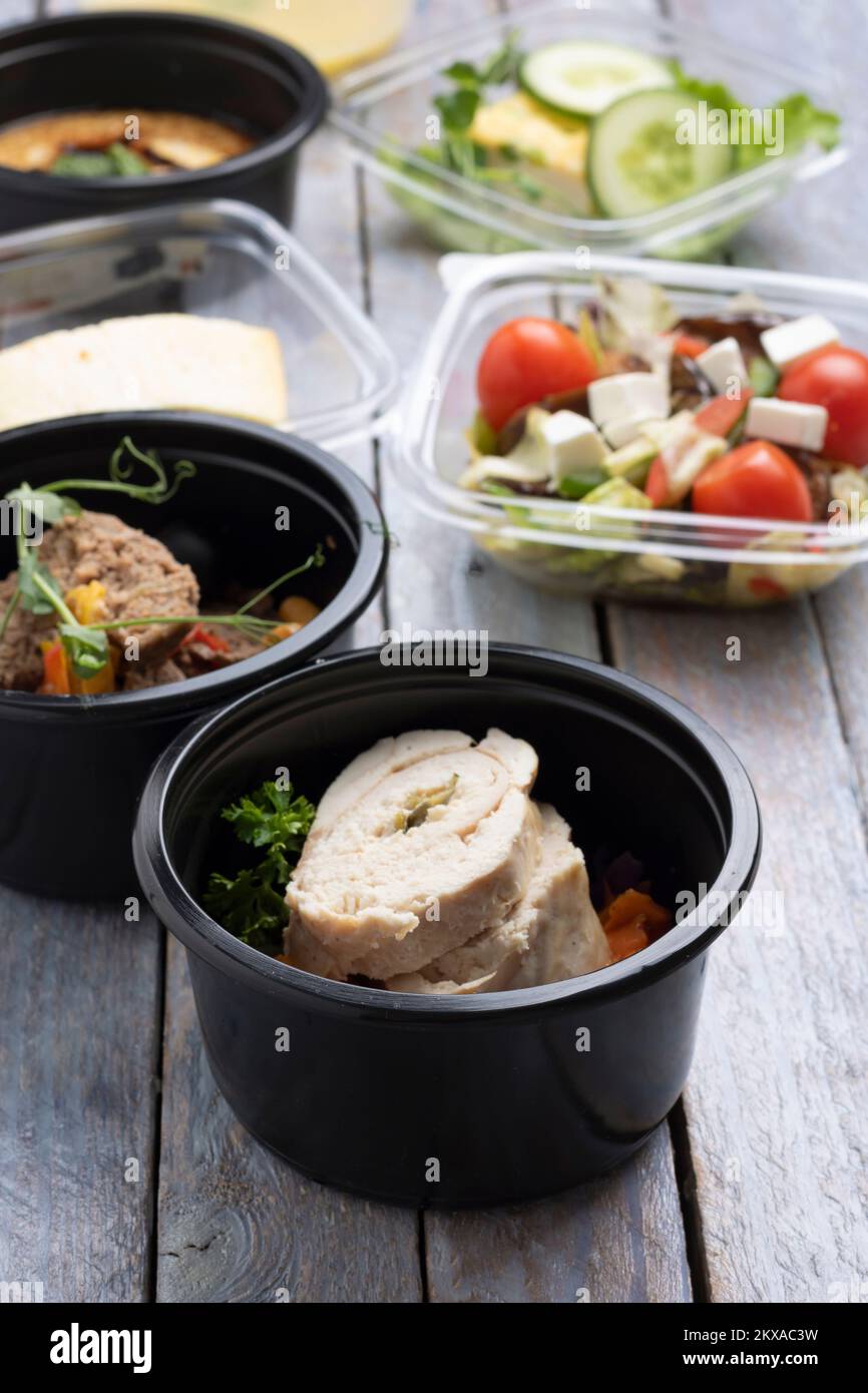 Ready meal to eat in take away boxes, vertical food Stock Photo - Alamy