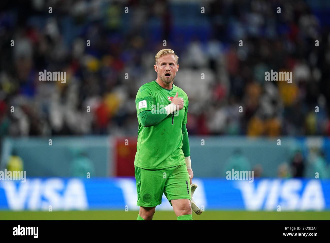 Denmark goalkeeper Kasper Schmeichel salutes the fans in reaction to ...