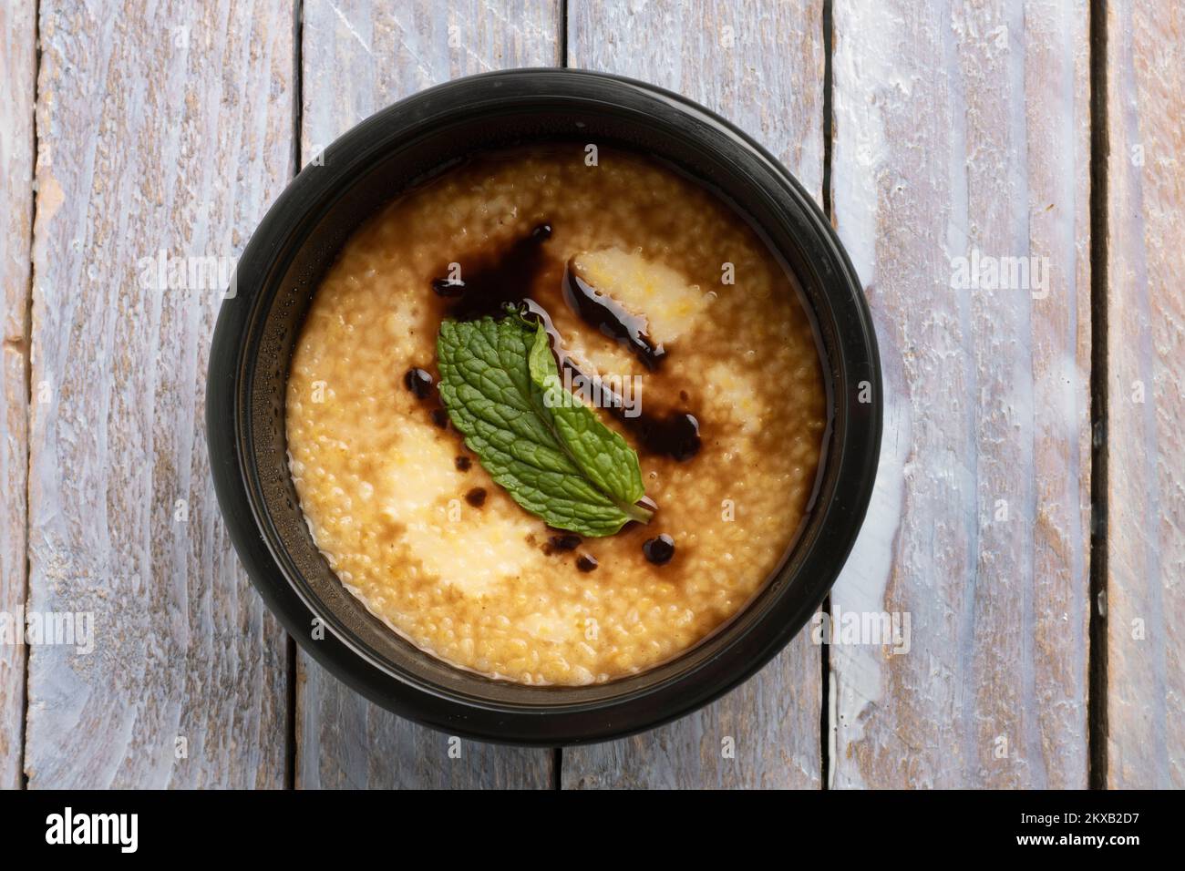 Vegan porridge in eco box for breakfast, top view Stock Photo - Alamy