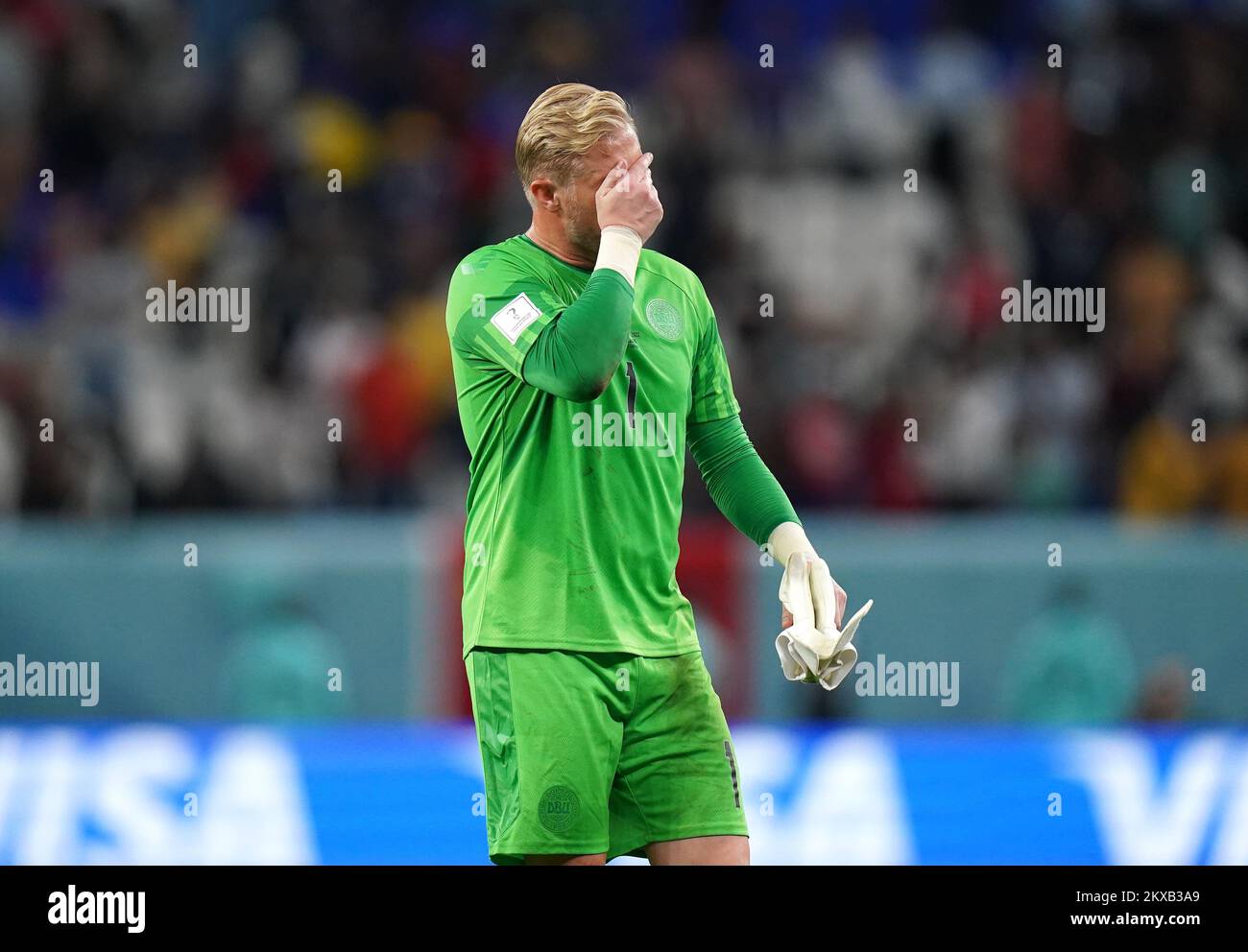 Denmark goalkeeper Kasper Schmeichel reacts to the team's exit from the ...