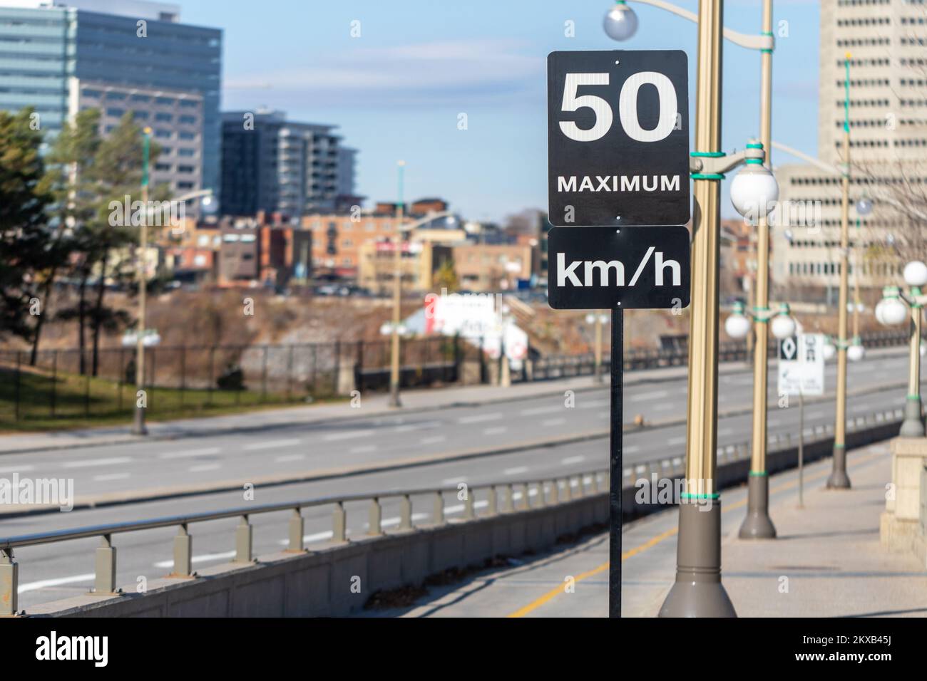 Speed limit road sign in the street, 50 km per hour maximum in Ottawa ... Speed limit road sign in the street, 50 km per hour maximum in Ottawa ...