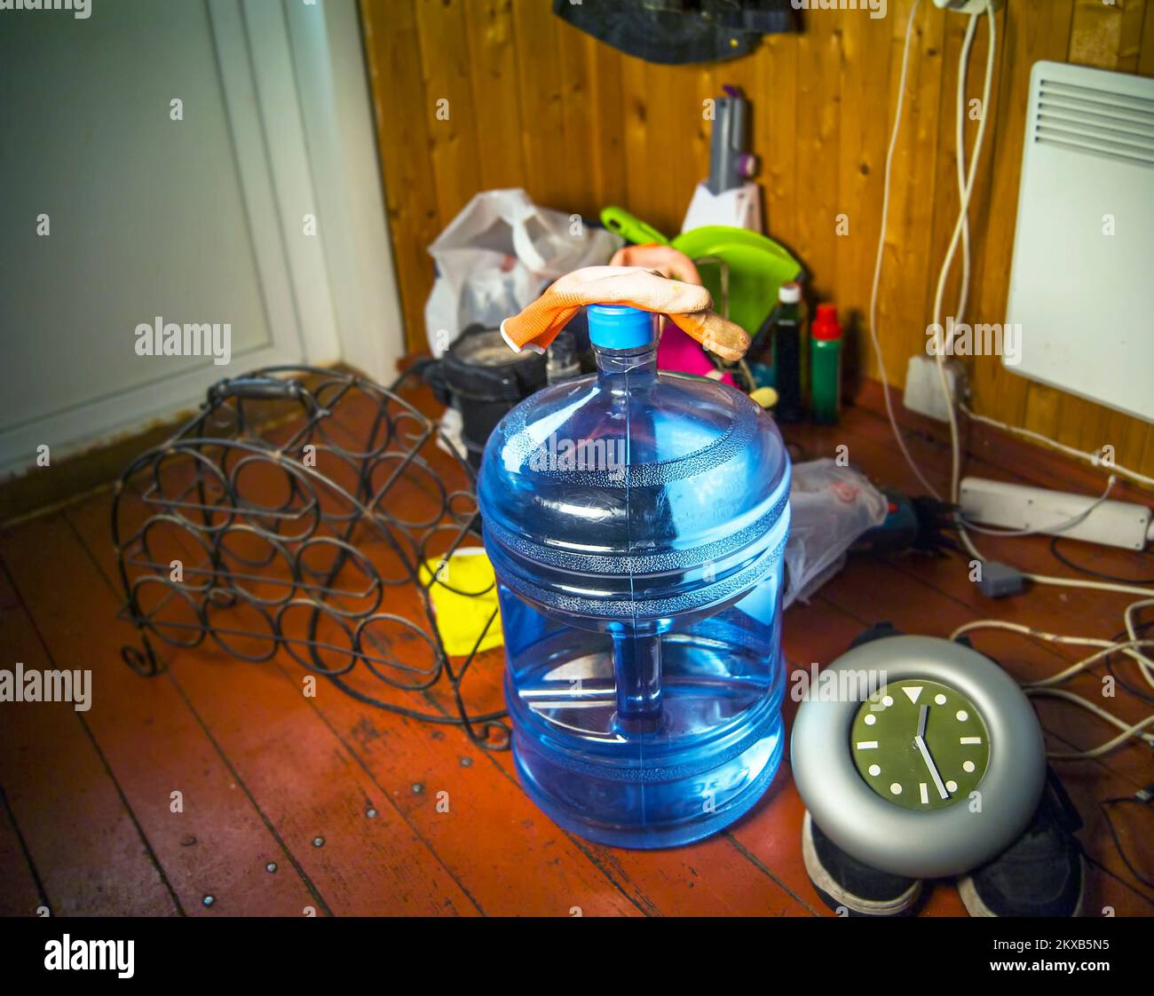 a big plastic still water bottle in a messy storage room Stock Photo ...