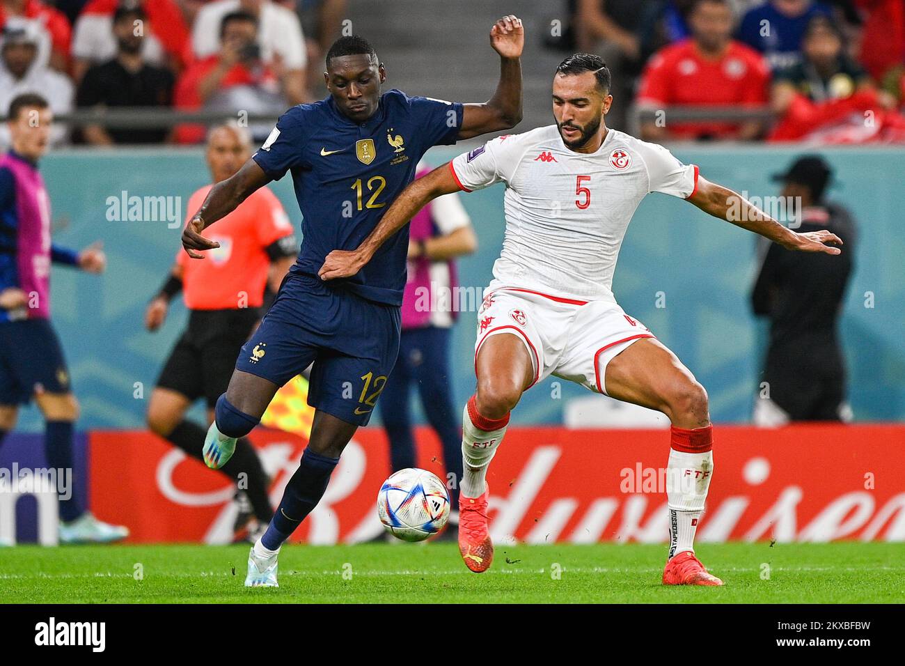 AL RAYYAN, QATAR - NOVEMBER 30: Randal Kolo Muani of France battles for ...