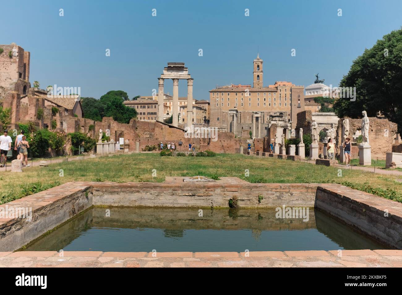 Rome, Italy - pond in the House of the Vestals courtyard. Ancient ruins ...