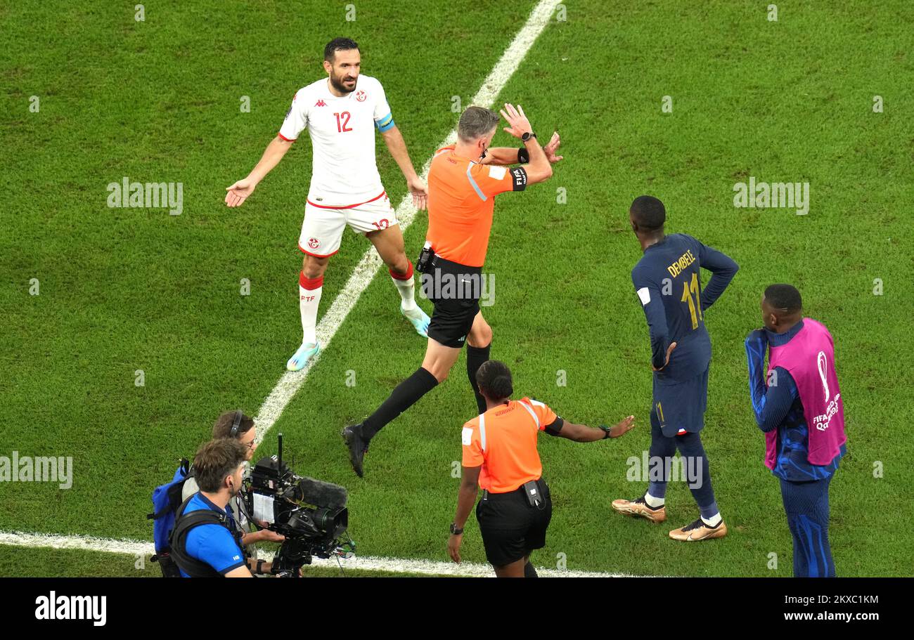 Referee Matthew Conger (centre) after ruling out France's Antoine ...
