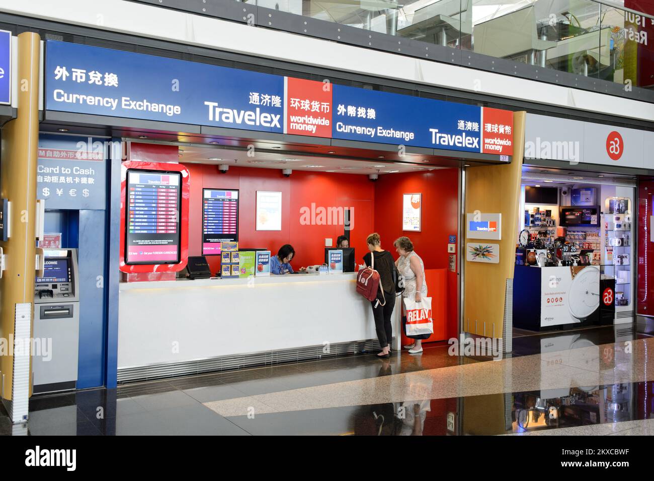 Currency exchange machine at airport terminal hi-res stock photography ...