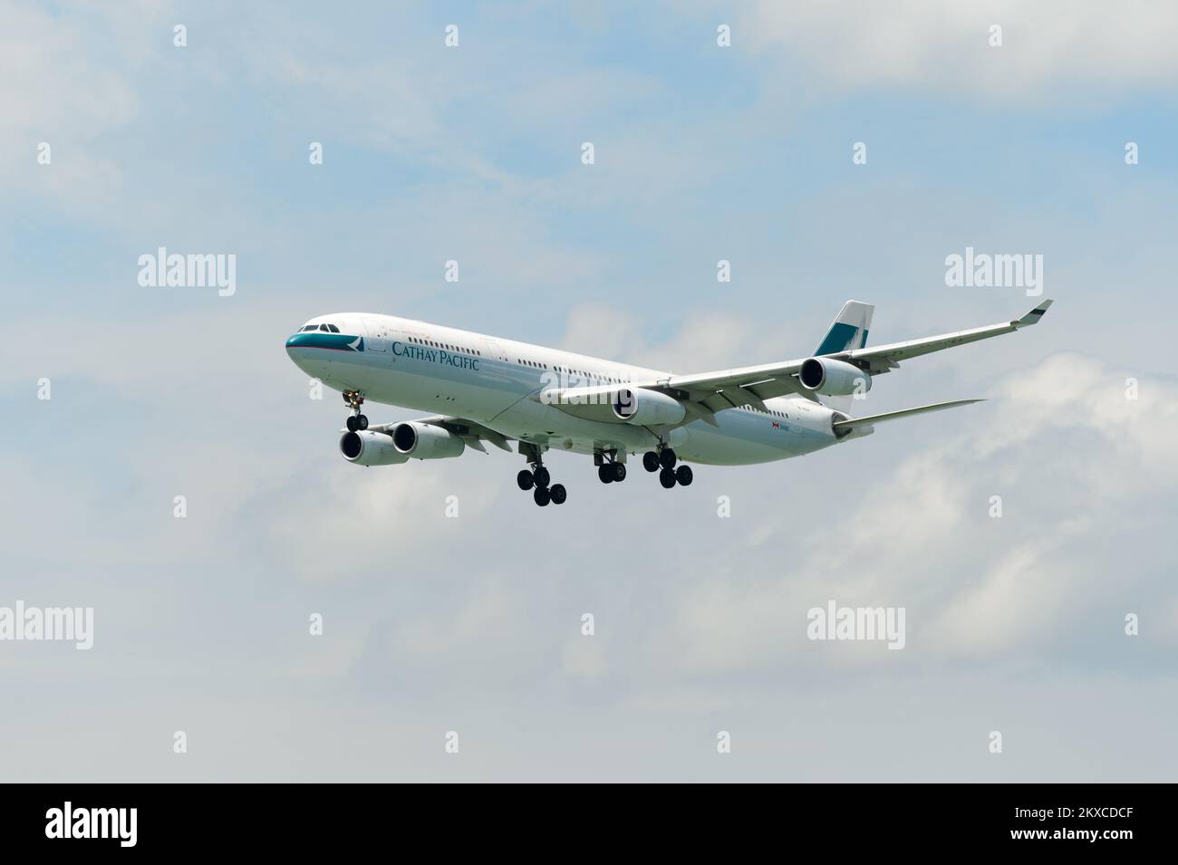 HONG KONG - JUNE 04, 2015: Cathay Pacific aircraft landing. Cathay ...