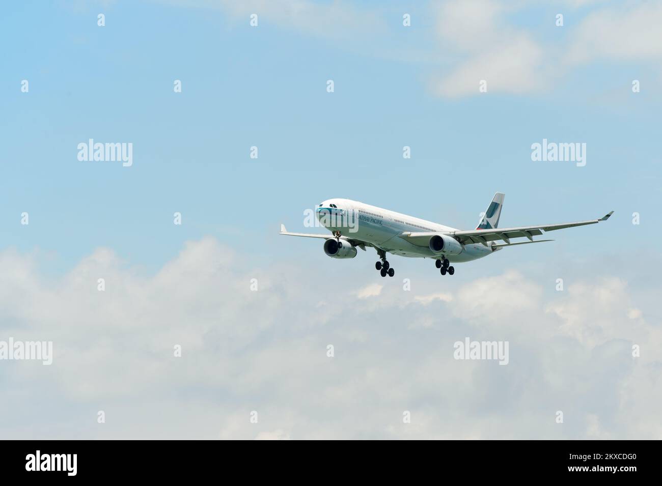 HONG KONG - JUNE 04, 2015: Cathay Pacific aircraft landing. Cathay ...