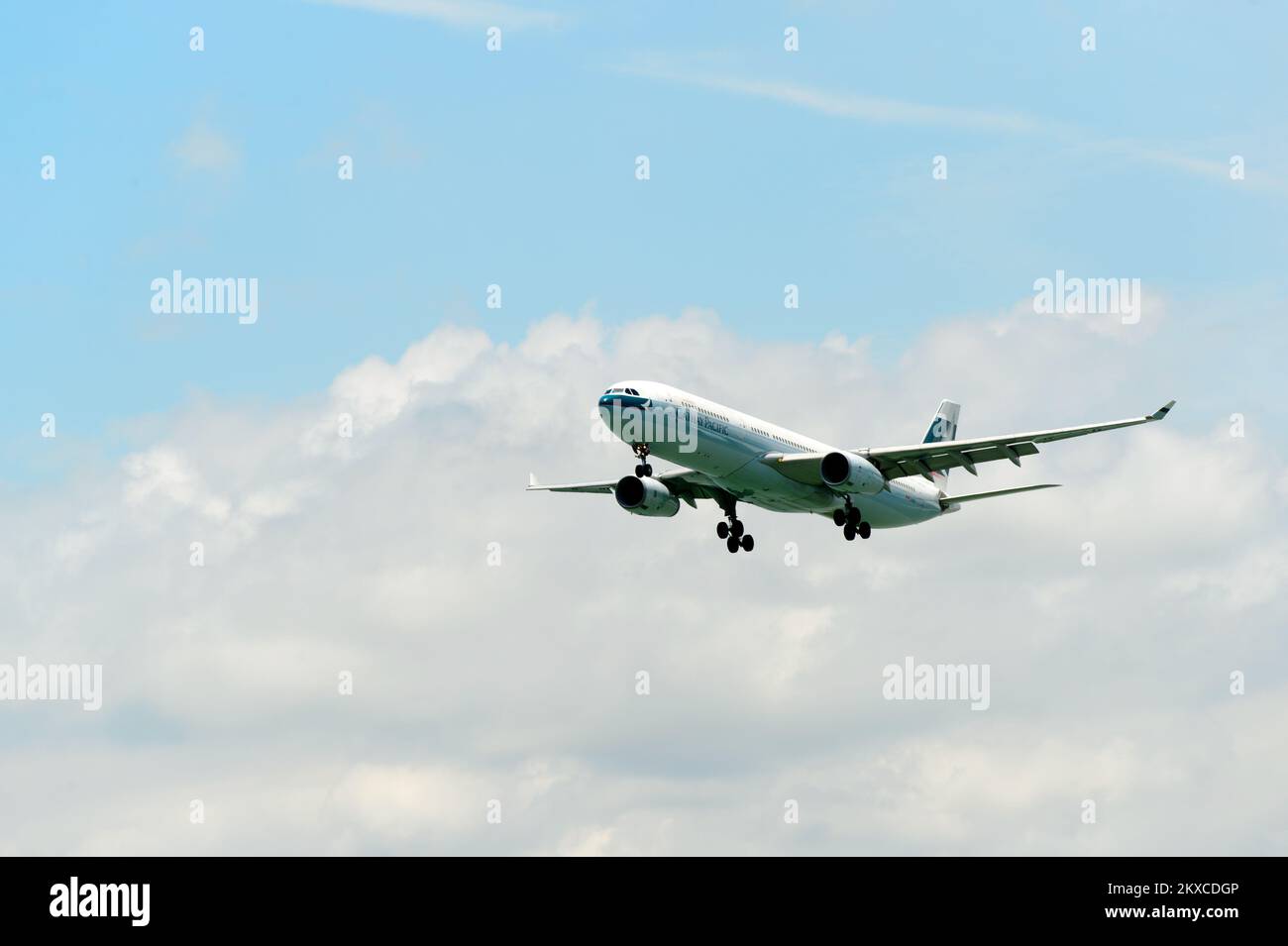 HONG KONG - JUNE 04, 2015: Cathay Pacific aircraft landing. Cathay ...