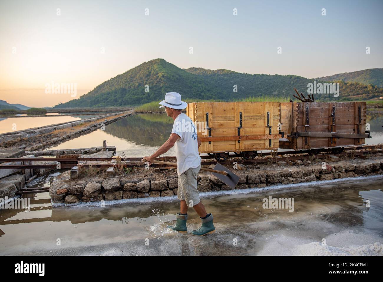 27.08.2019., Ston, peninsula Peljesac - Sea salt harvest in Solana Ston ...