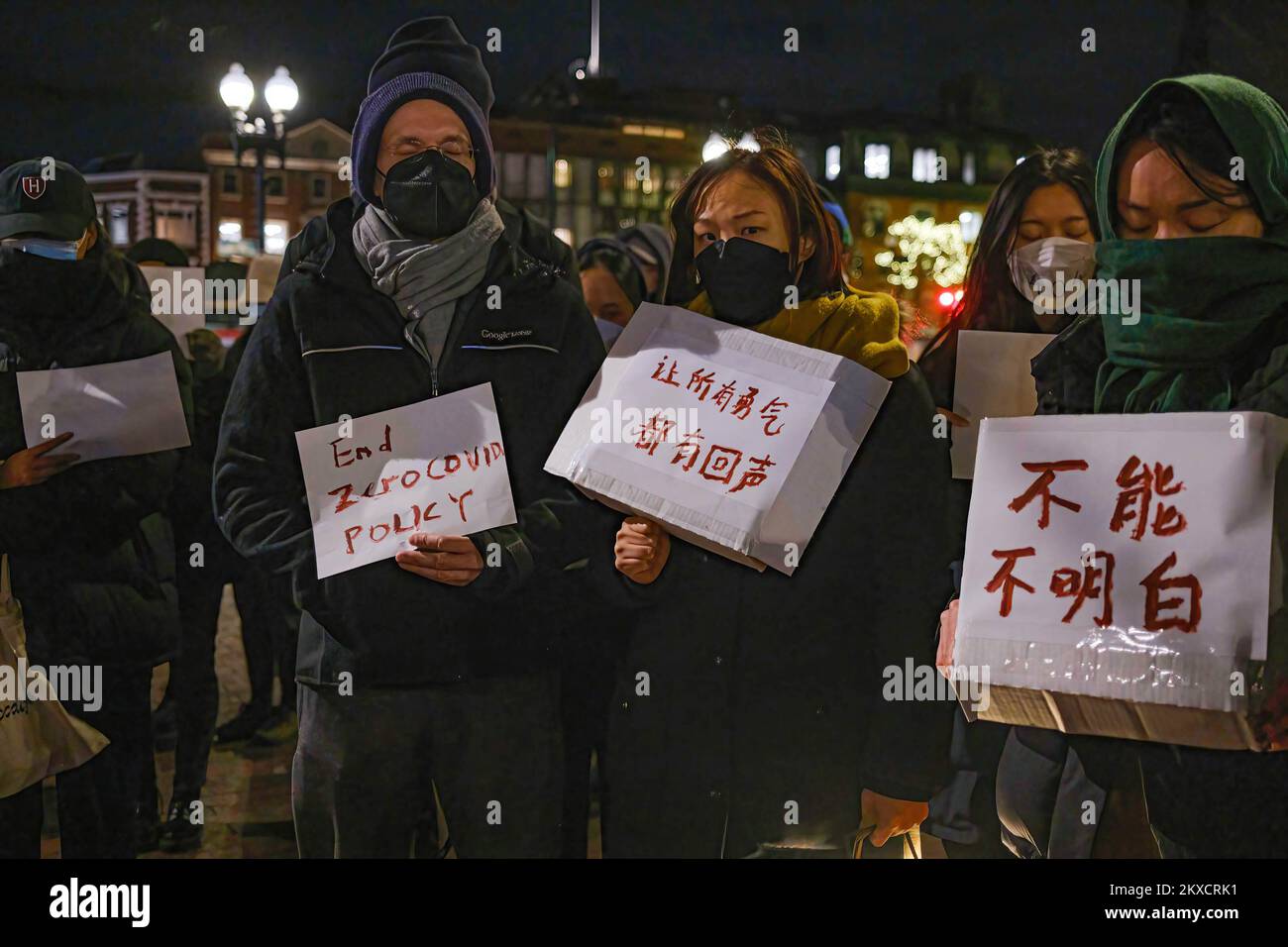 Boston, United States. 29th Nov, 2022. Protesters hold placards during ...