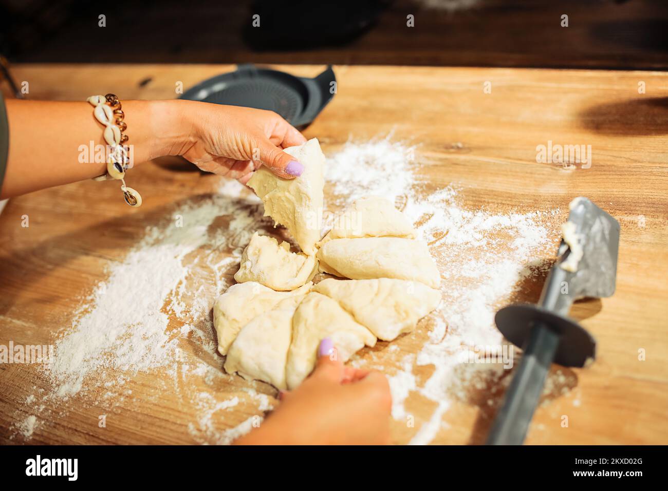 Cutting dough hi-res stock photography and images - Alamy