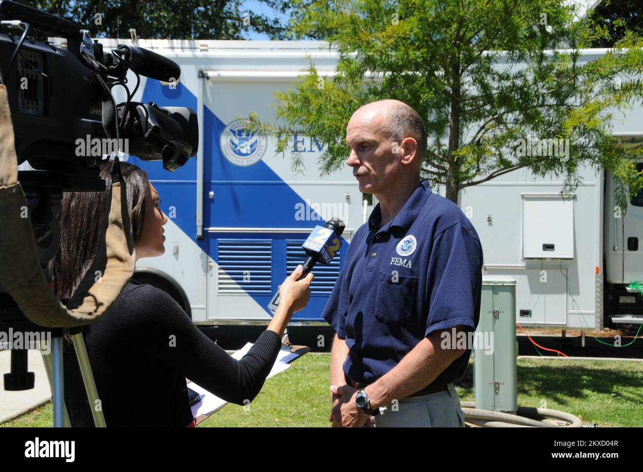 Interview with local tv station hi-res stock photography and images - Alamy