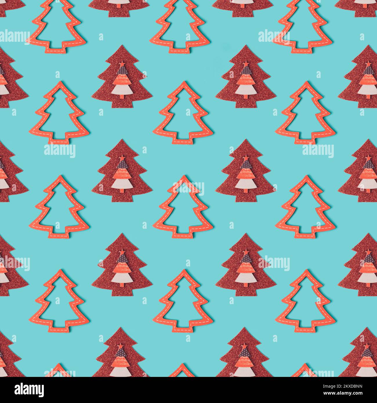 Christmas tree red ornaments pattern on a pastel blue background ...