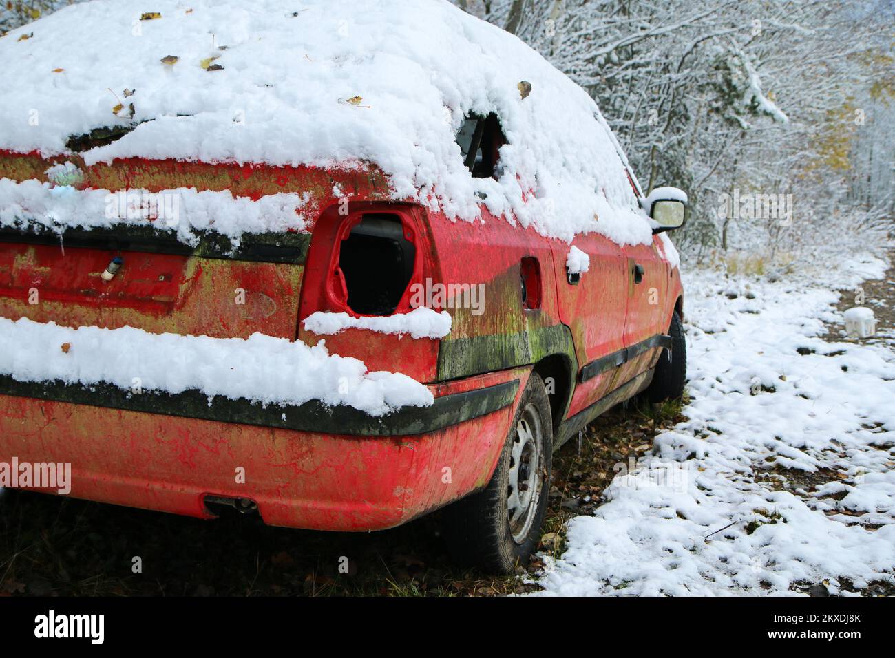 Abandoned car standing by the road. Maybe after the traffic accident or ...