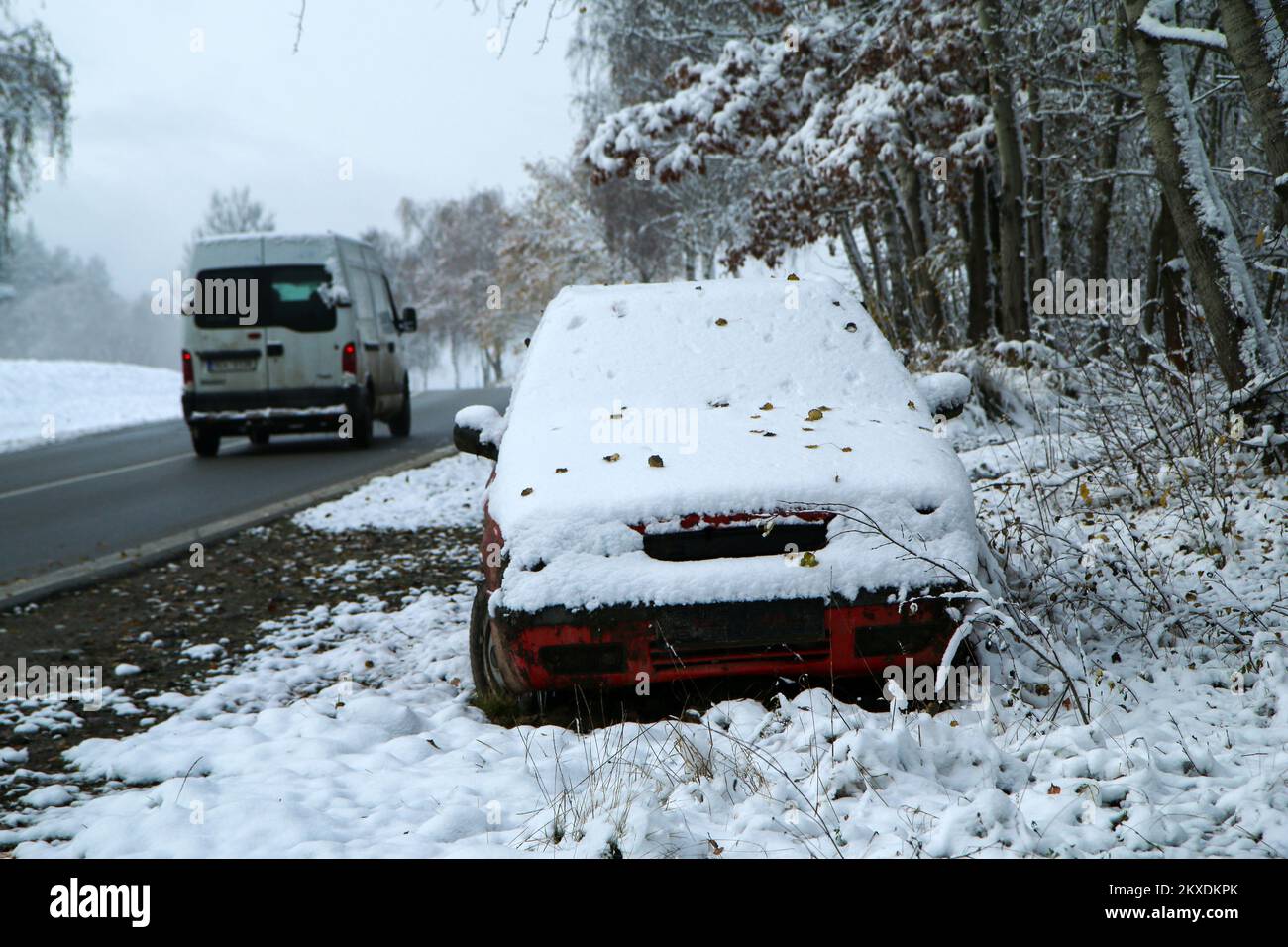 Abandoned car standing by the road. Maybe after the traffic accident or ...