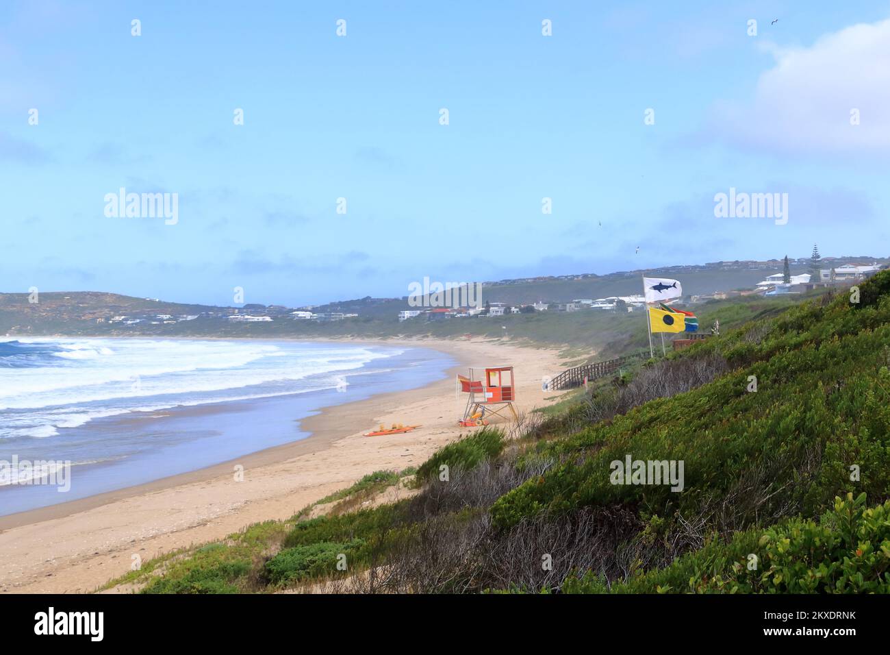 Lifeguard equipment in yellow and red colors and shark danger on the ...