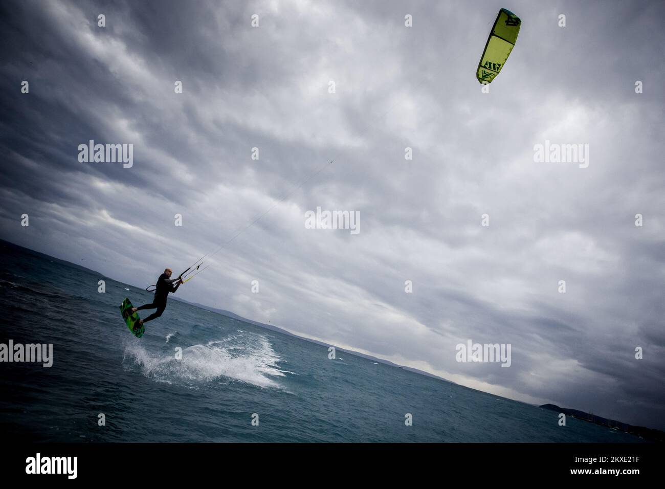 18.12.2019., Split, Croatia - Kitesurfing in front of the Znjan beach ...