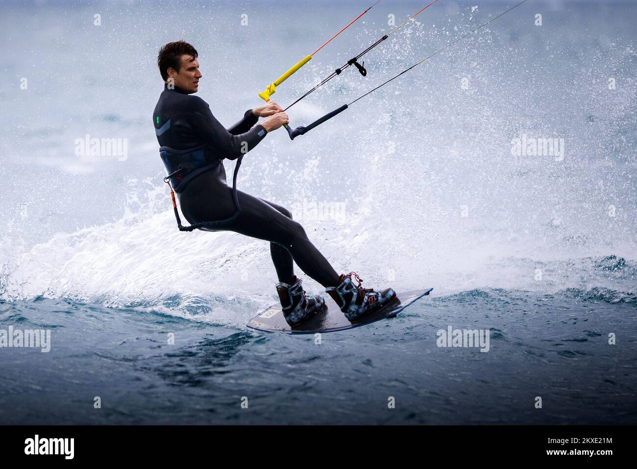 18.12.2019., Split, Croatia - Kitesurfing in front of the Znjan beach ...