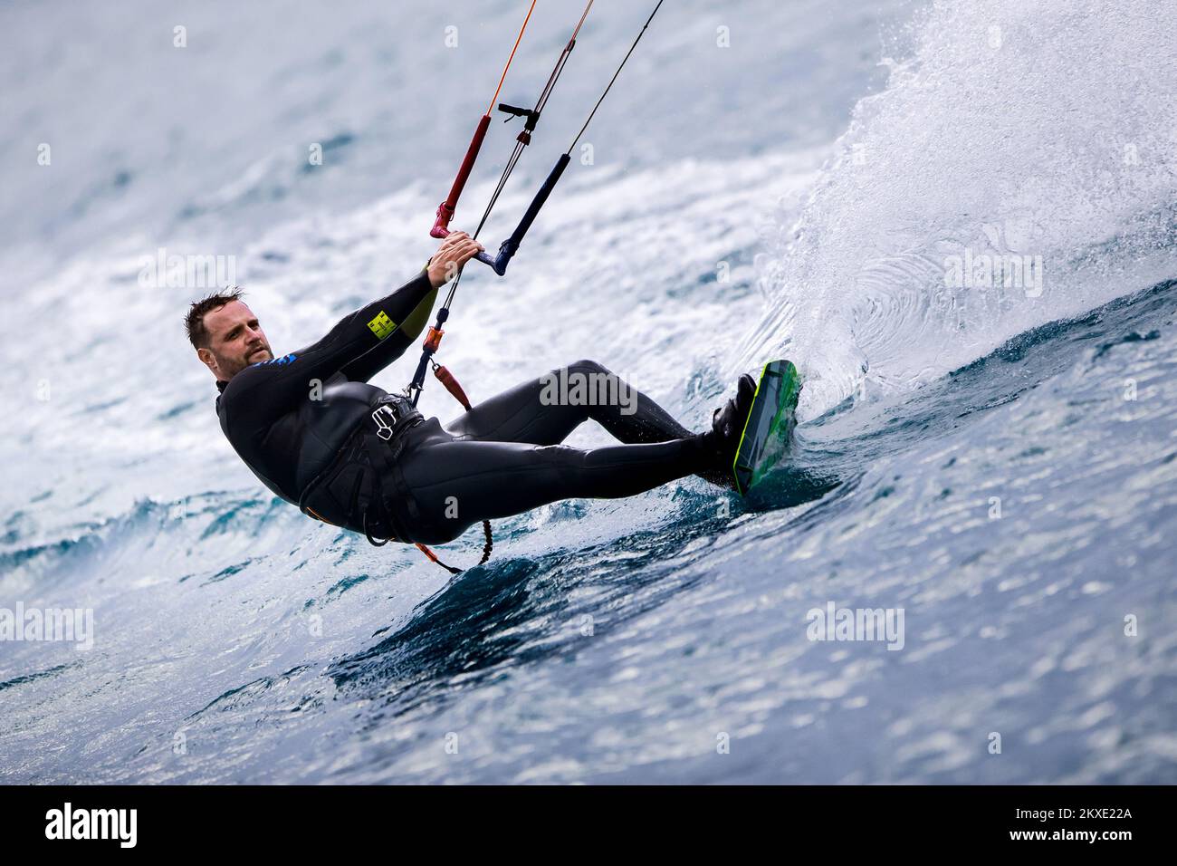 18.12.2019., Split, Croatia - Kitesurfing in front of the Znjan beach ...