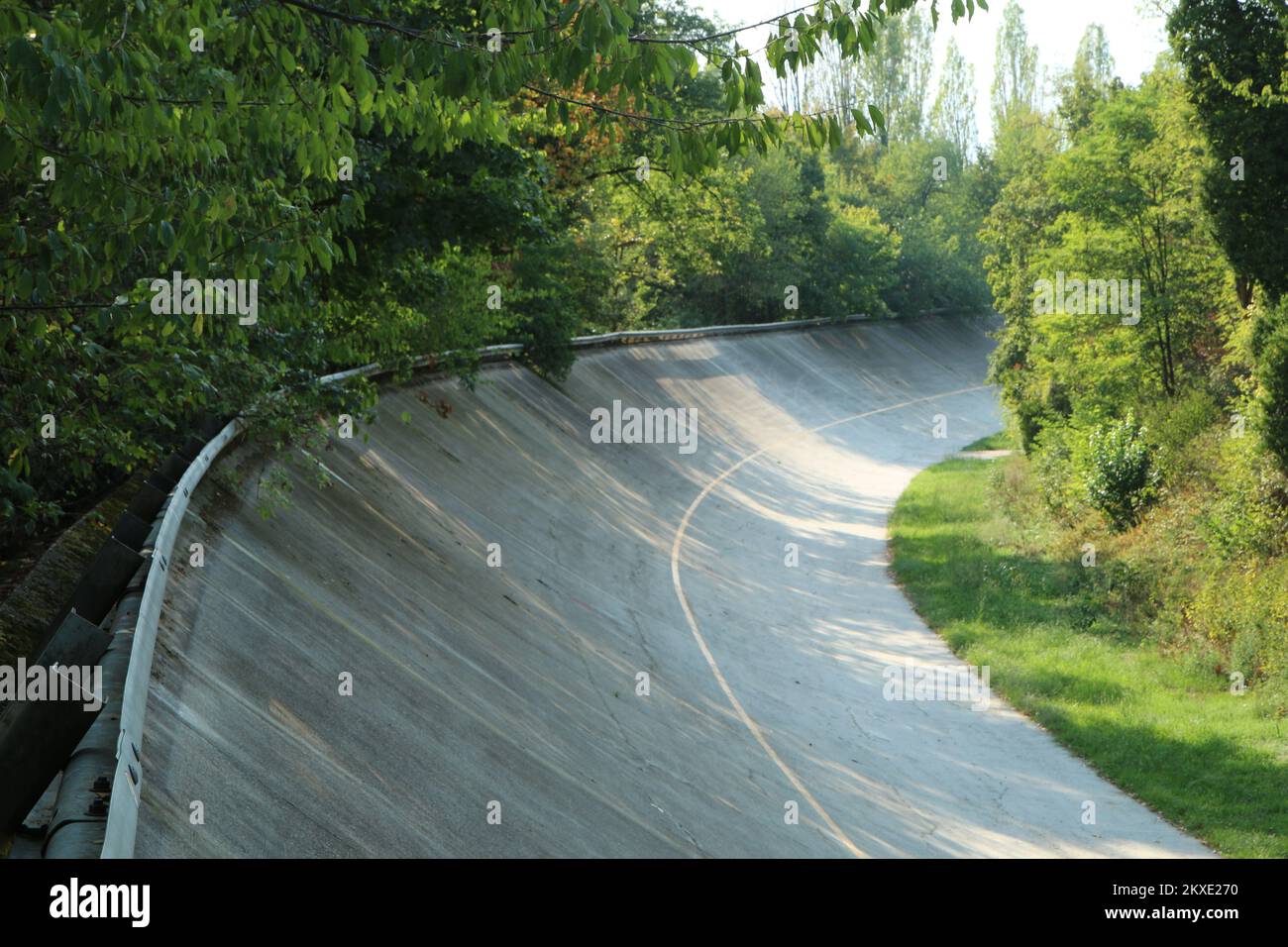 The famous historic inclined curve at the old racing circuit at Monza ...