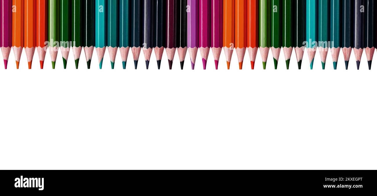 Coloured pencils border isolated on white background. Ads banner with ...