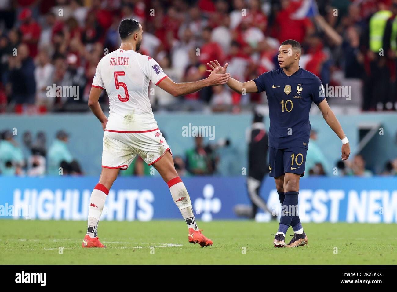 Al Rayyan, Qatar. 30th Nov, 2022. Kylian Mbappe (R) of France greets ...