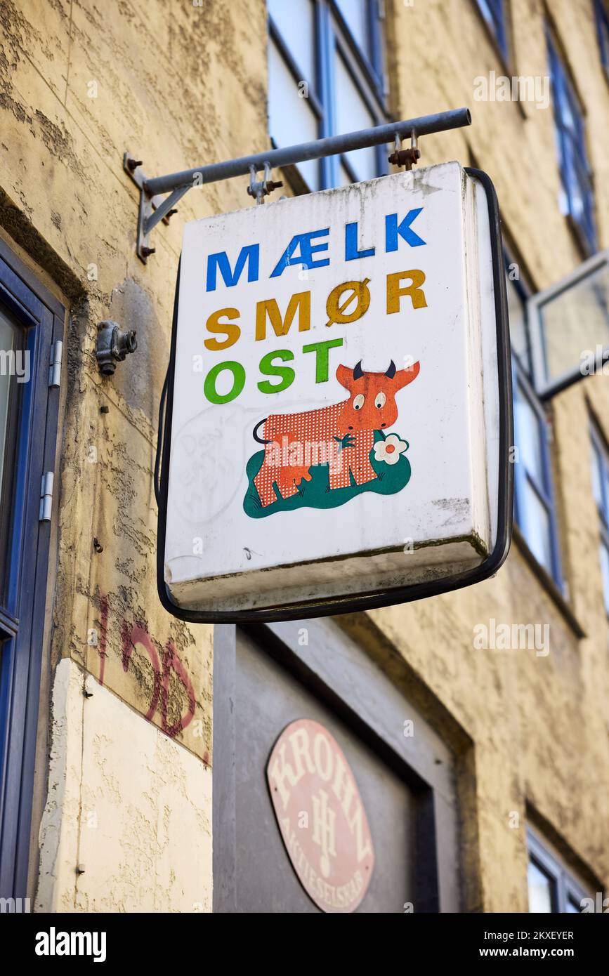 "Mælk, Smør, Ost" ('Milk, Butter, Cheese'), old sign with cow mascot ...