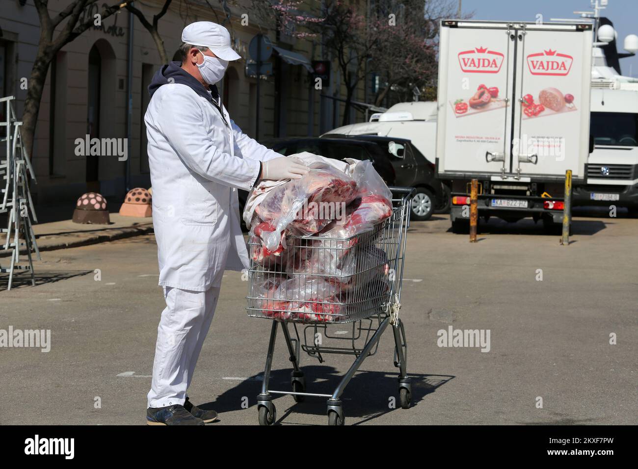 06.04.2020., Rijeka, Croatia - Butcher delivering fresh meat on the ...