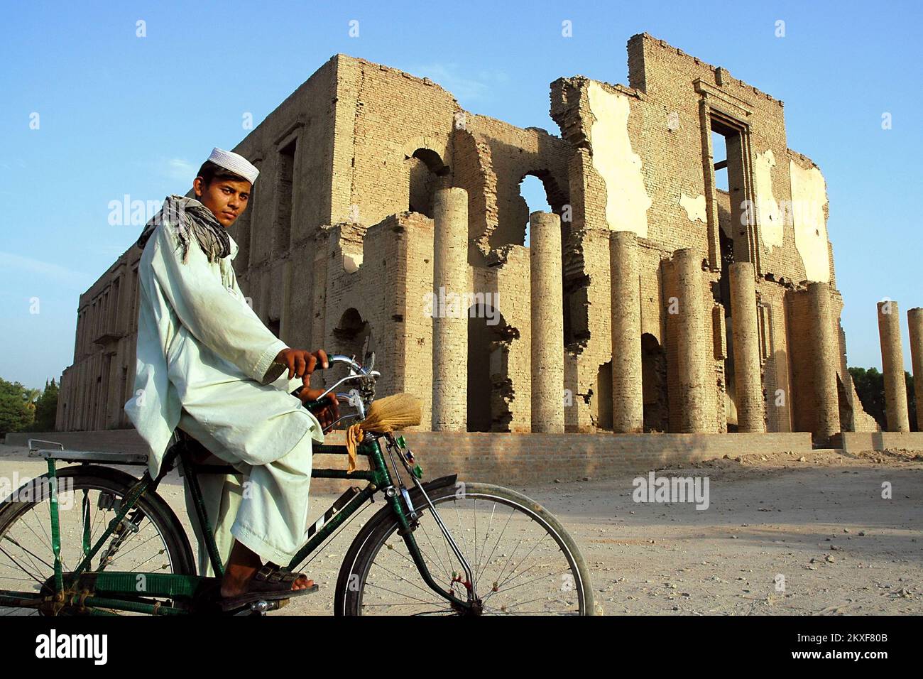 Jalalabad, Nangarhar Province / Afghanistan: A man rides a bicycle in ...
