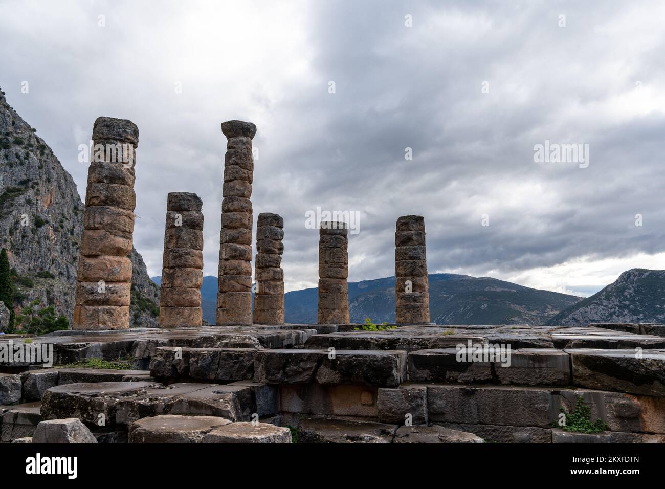 Delphi, Greece - 7 November, 2022: view of Doric columns and temple ruins in the Sanctuary ...