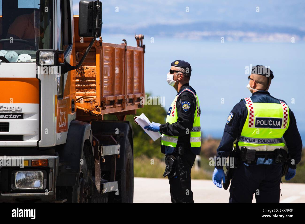 09.05.2020., Nerezisca, Brac island, Croatia - Police on the entrance ...