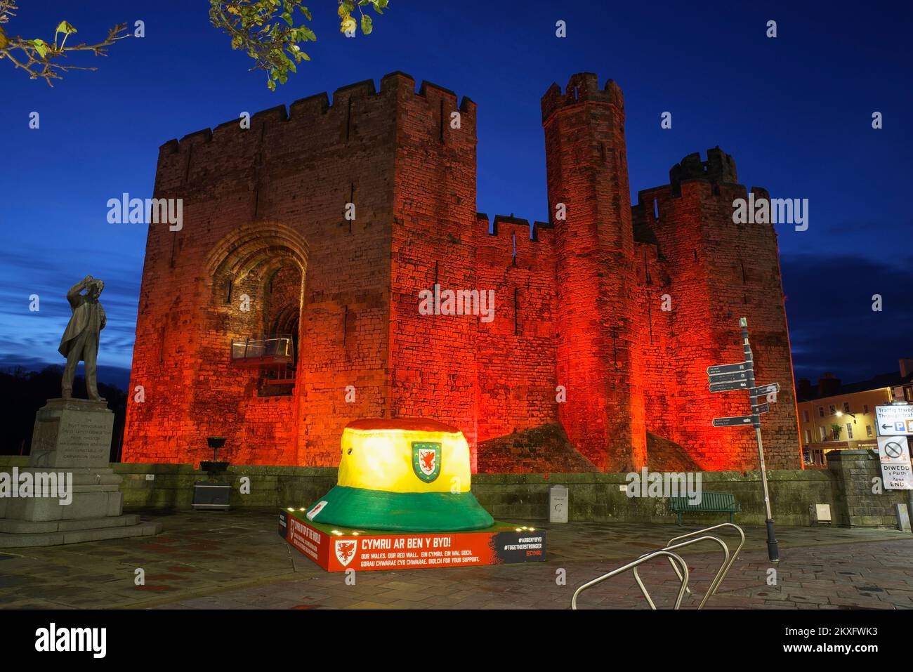 Caernarfon Castle, illuminated red to commemorate Wales Football team ...